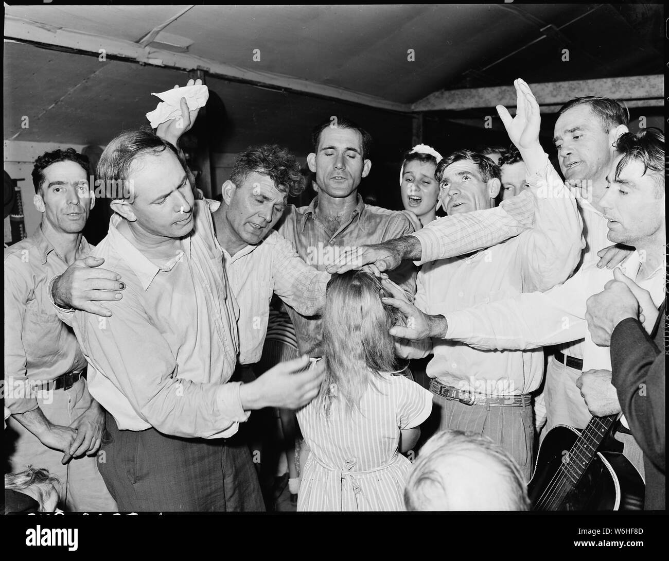 Healing laying on of hands ceremony in the Pentecostal Church of God ...