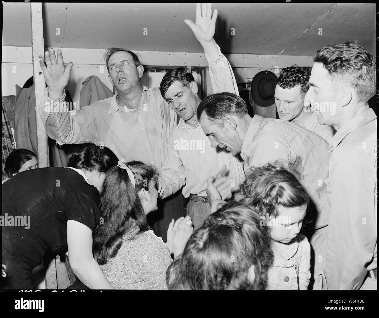 Healing laying on of hands ceremony in the Pentecostal Church of God ...