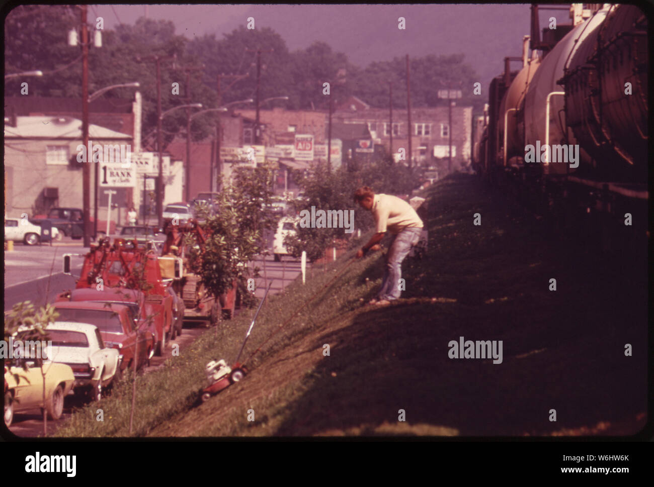 INGENIOUS METHOD OF MOWING STEEP RAILROAD SLOPE ON DUPONT AVENUE IN ...