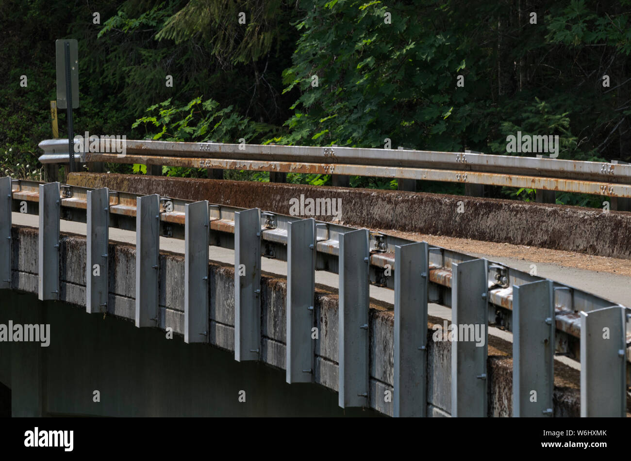 A curved bridge, built for logging, crosses Laying Creek, in Bureau of ...