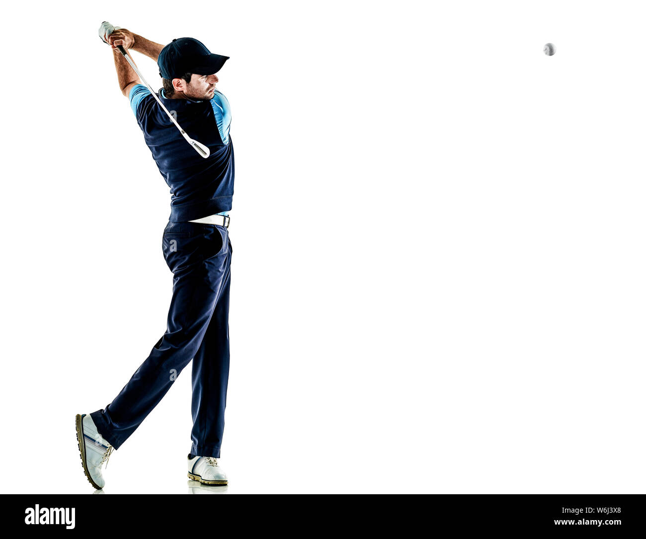 one caucasian man golfer golfing in studio isolated on white background ...