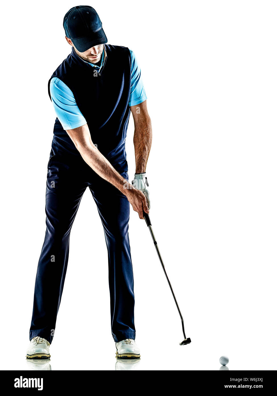 one caucasian man golfer golfing in studio isolated on white background ...