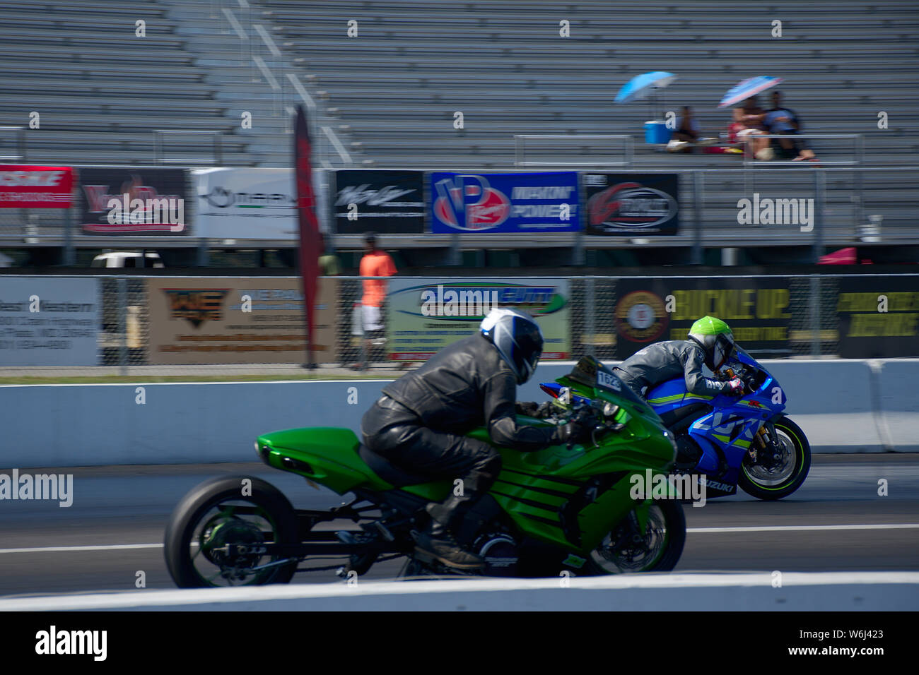 Two motorcycles during drag race at Maryland National Raceway Stock ...