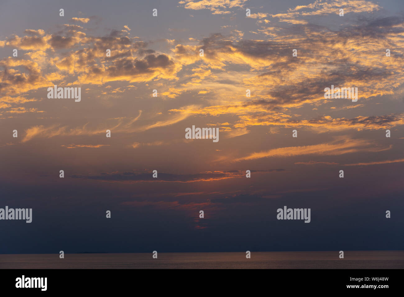 Cloud at sunset Stock Photo - Alamy