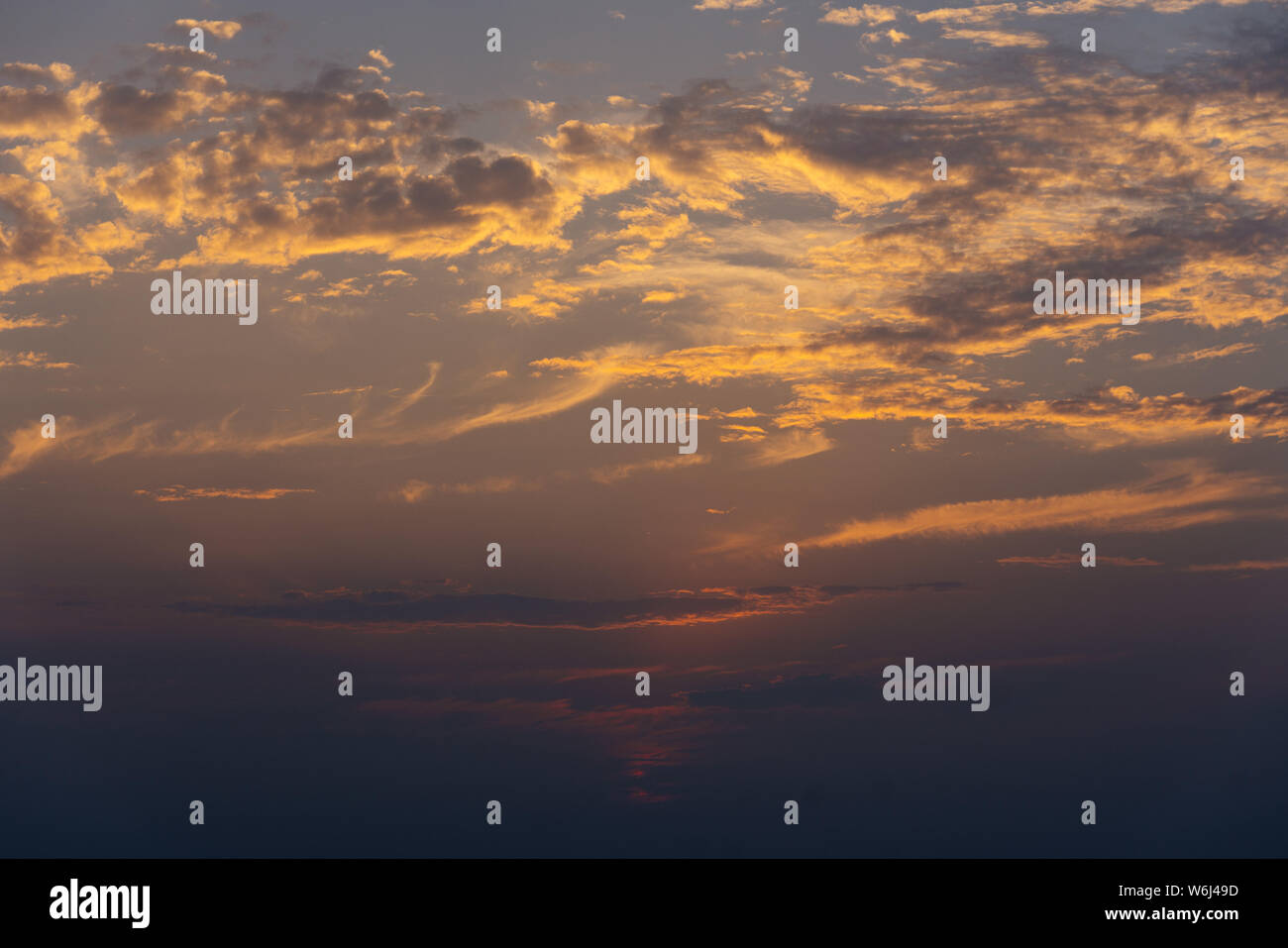 Cloud at sunset Stock Photo - Alamy