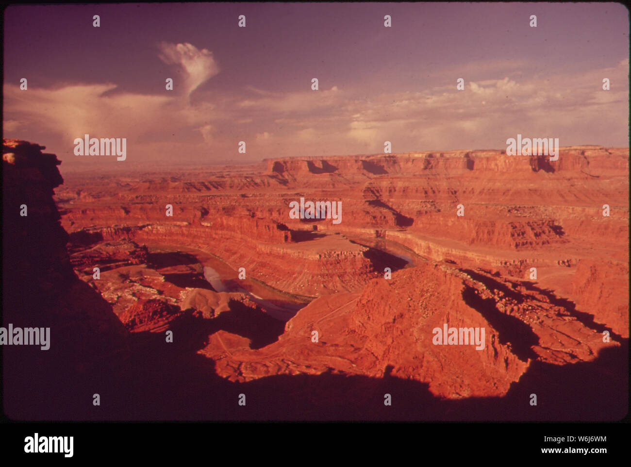 LOOKING SOUTH OVER THE COLORADO RIVER TO CANYONLANDS NATIONAL PARK. THE ...