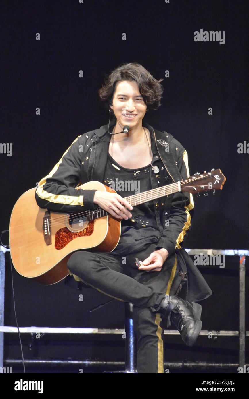 Japanese actor and model Junnosuke Taguchi performs during his fan ...