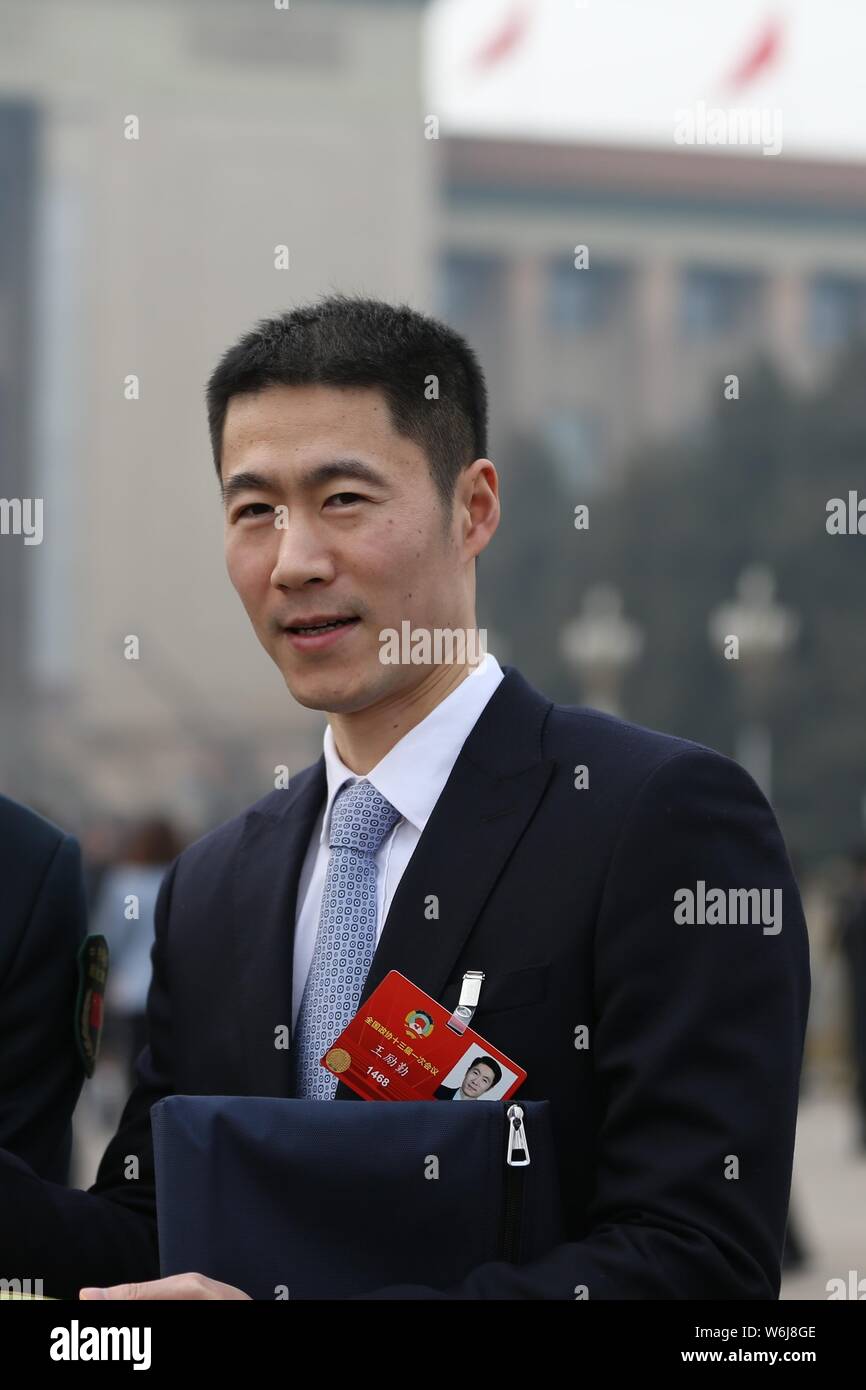 Retired Chinese table tennis player Wang Liqin arrives at the Great Hall of the People to attend the opening session for the First Session of the 13th Stock Photo Alamy