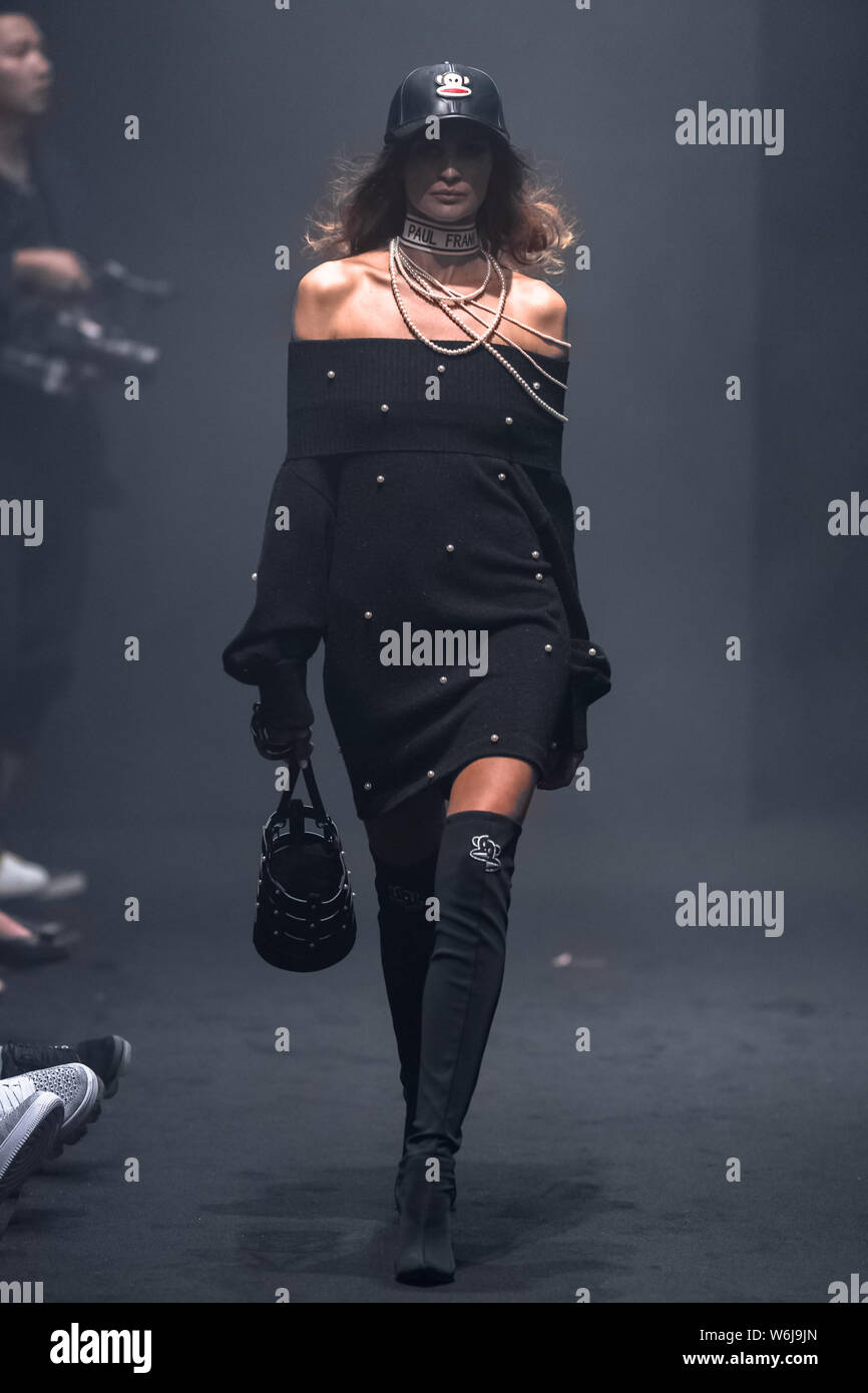 A model displays a new creation at the fashion show of Paul Frank ...