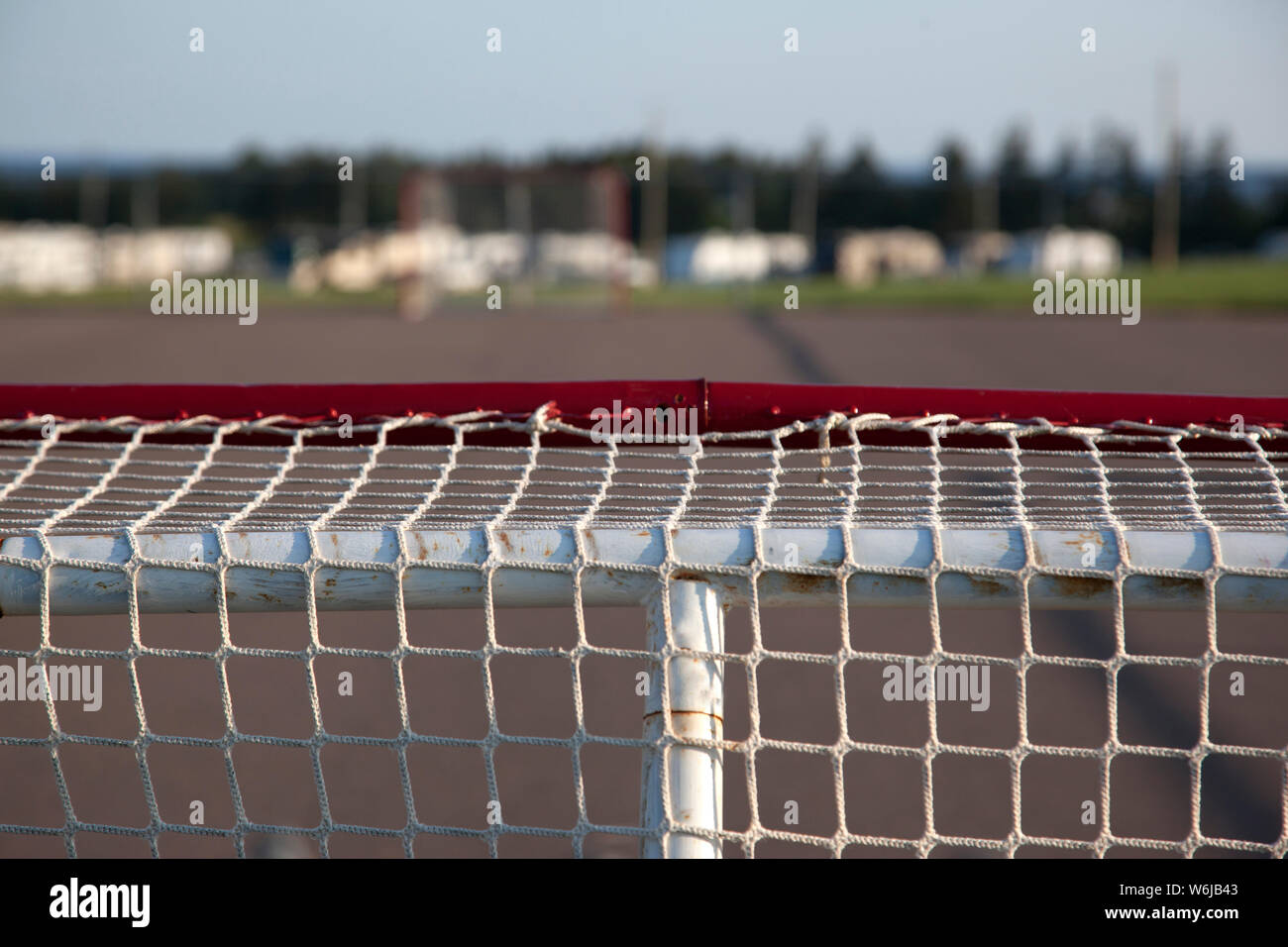 Outside or roadside hockey net with park in the background Stock Photo ...