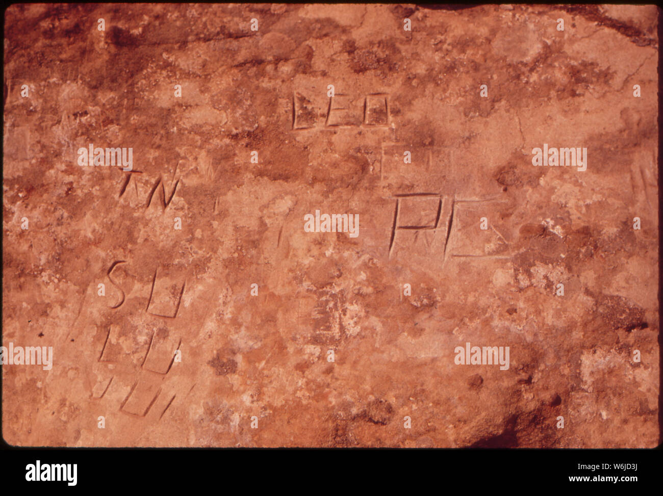 MODERN GRAFFITI CARVED INTO ROCK NEAR CLIFF PALACE Stock Photo - Alamy