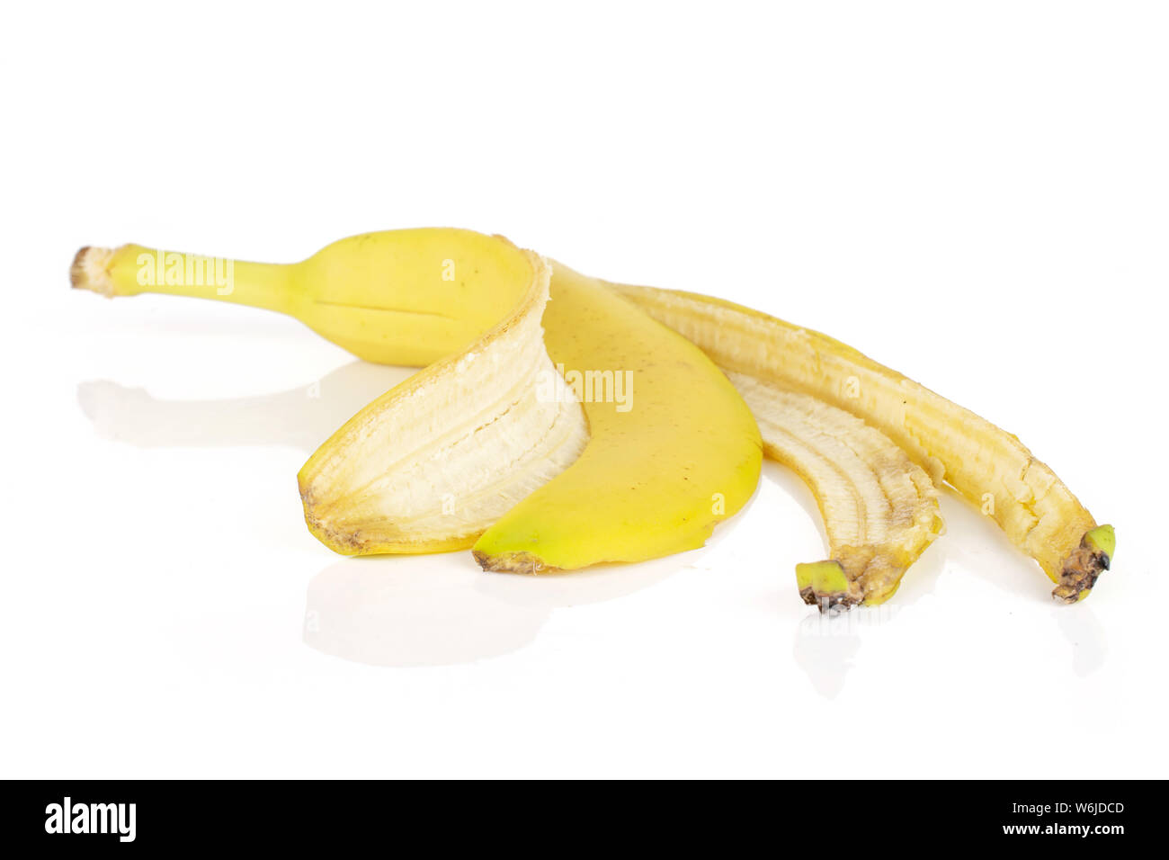 Skin of ripe yellow banana isolated on white background Stock Photo - Alamy
