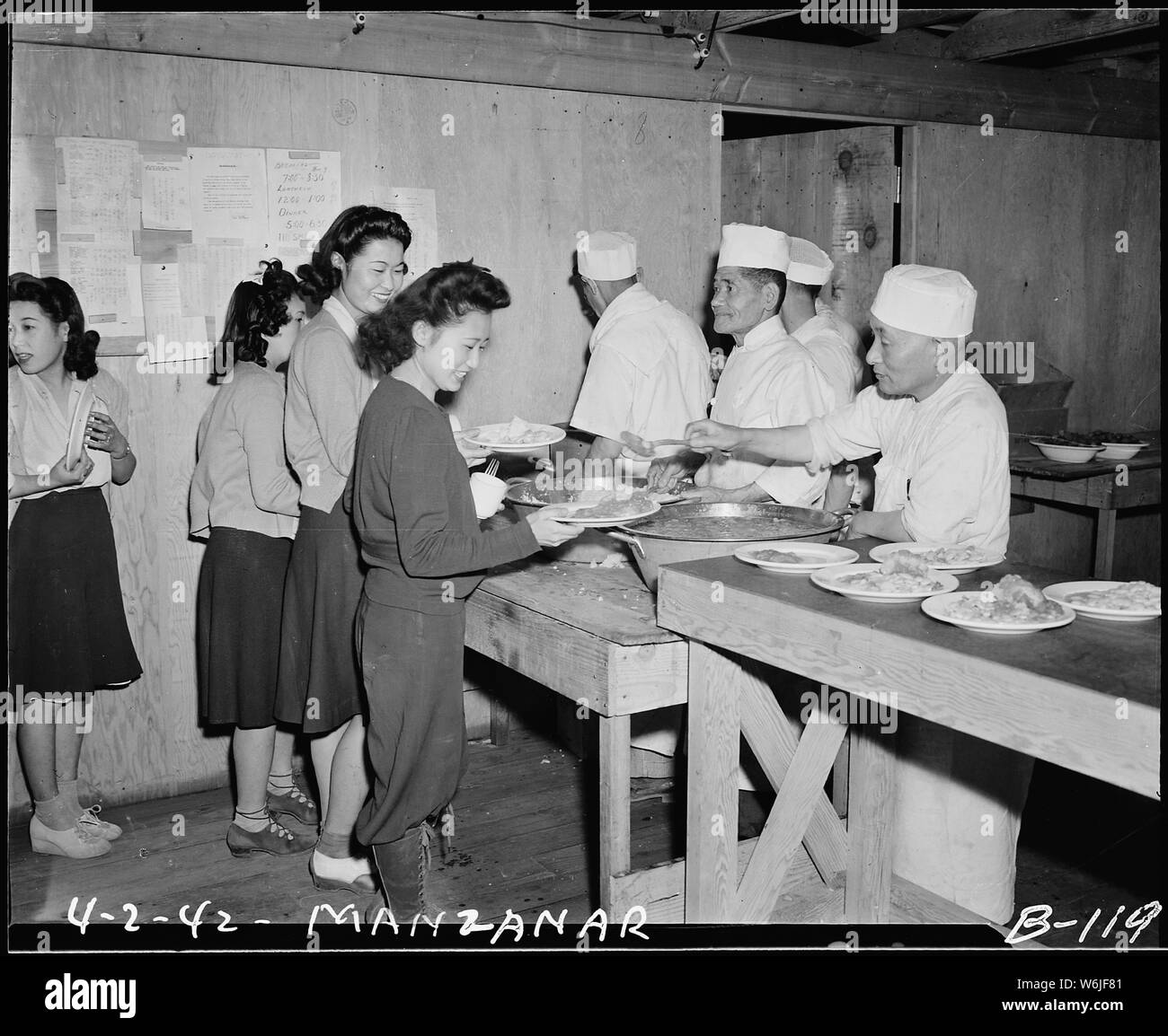 Manzanar Relocation Center, Manzanar, California. Mealtime shortly ...