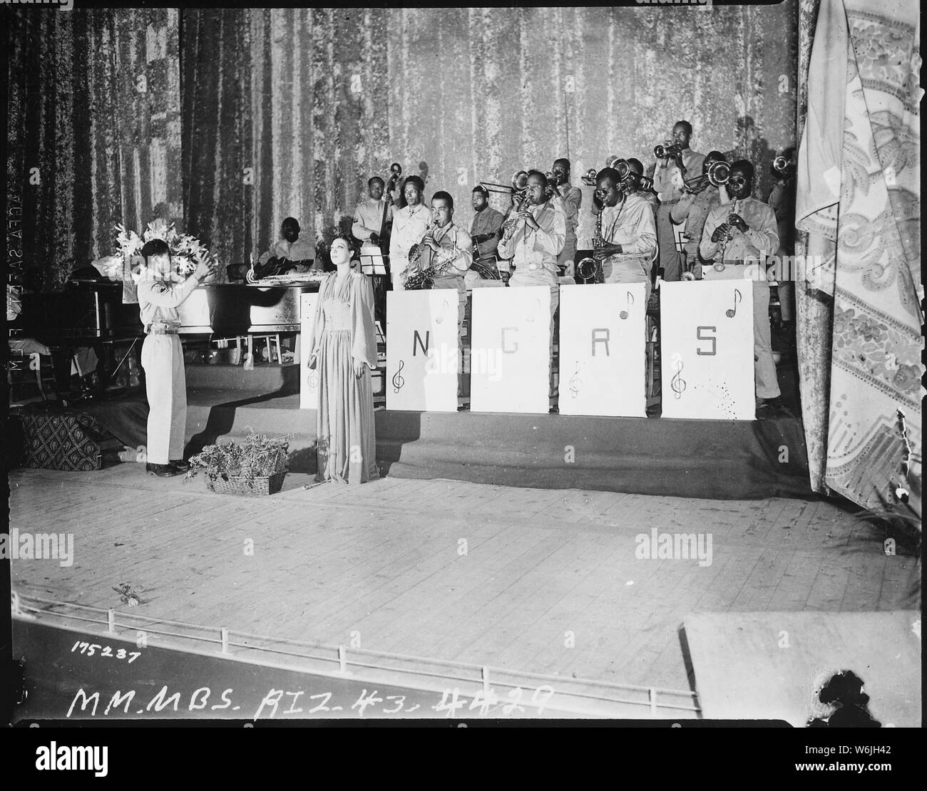 Miss Josephine Baker, popular stage performer, sings the National ...