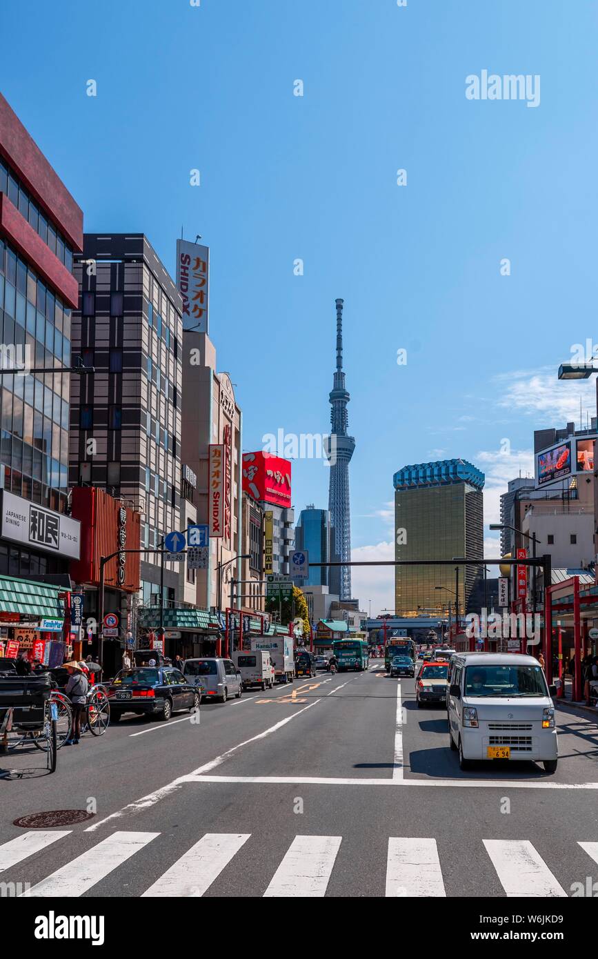 Street, rear skyscrapers and the Tokyo Skytree, Asakusa, Tokyo, Japan ...