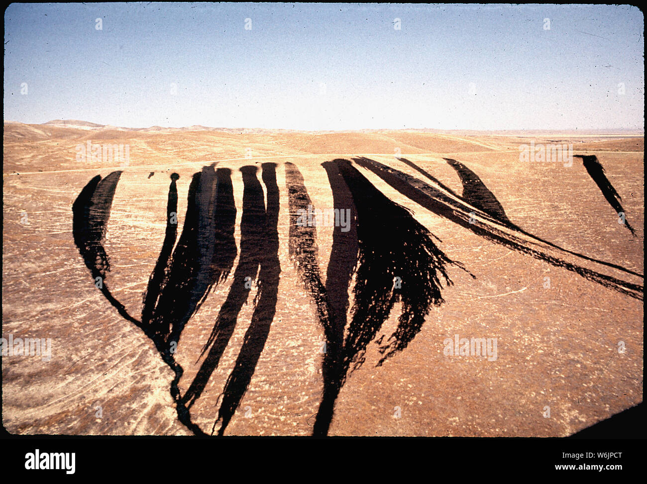 OIL WASTE ON BARREN HILLSIDE Stock Photo - Alamy