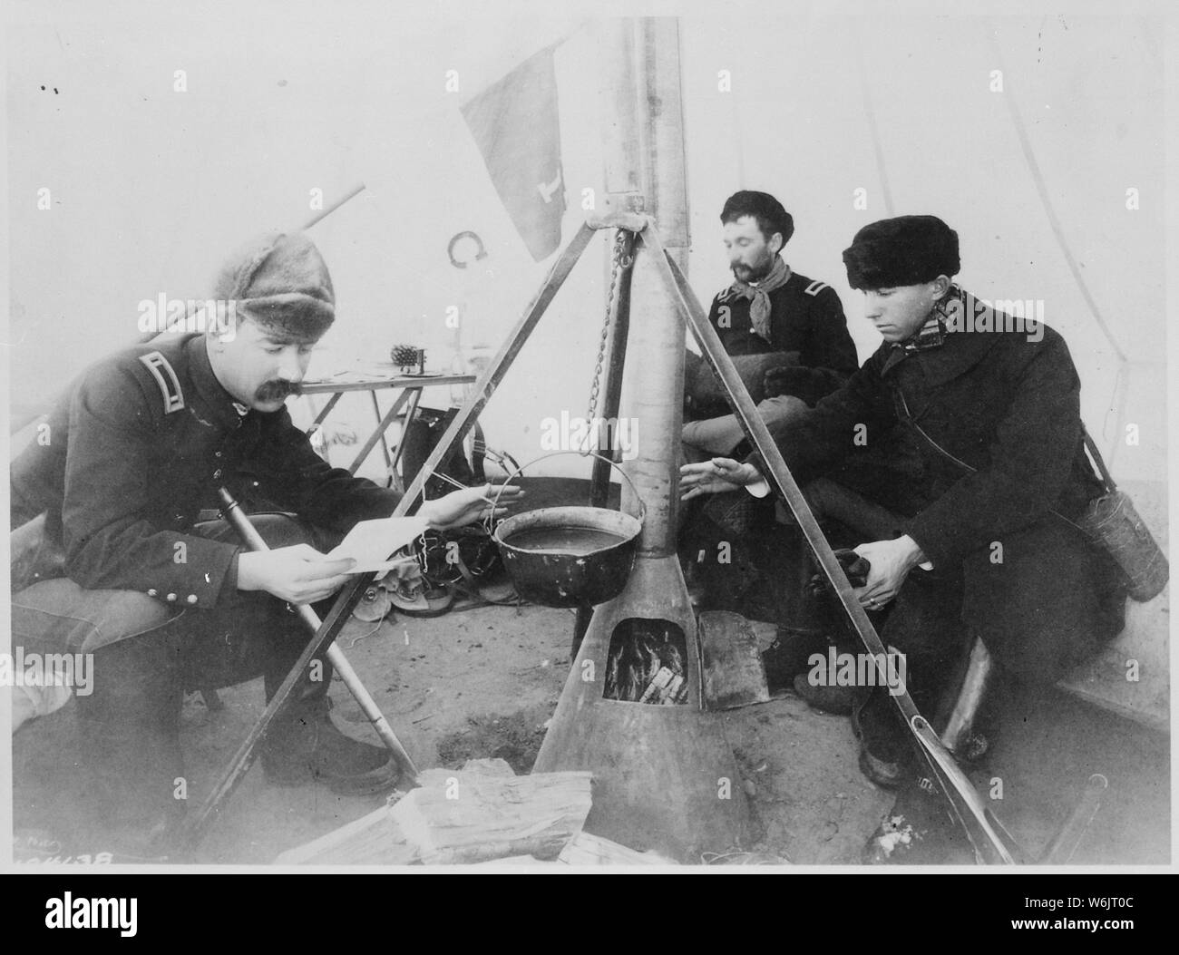 Officers in tent by fire during the Pine Ridge campaign, 1890--91 Stock ...