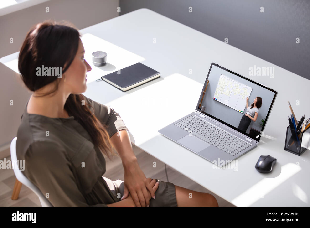 Woman Leaning New Skill Online. Watching Video Tutorial Stock Photo - Alamy