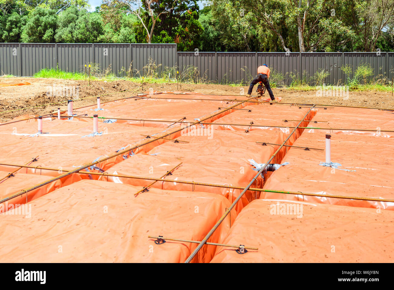 Australian builder performing steel fixing works of a new suburban ...