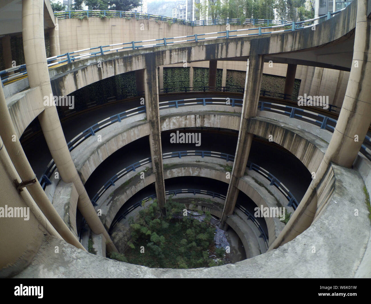 Aerial view of the 5-story high spiral parking lot at a residential ...