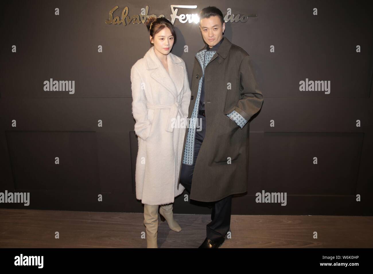 Chinese actress Sandra Ma Sichun, left, and actor Zhou Yiwei arrive for ...