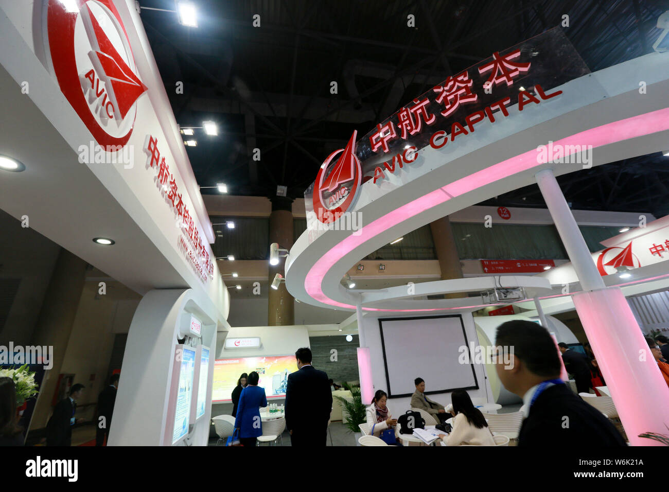 --FILE--People visit the stand of AVIC Capital of AVIC (Aviation ...