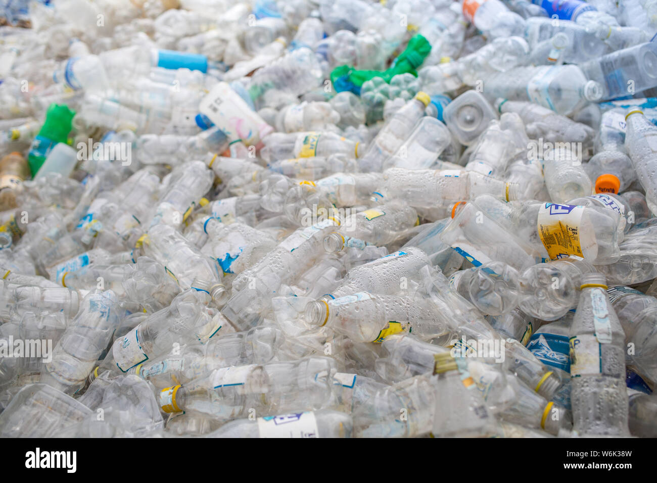 Heaps of plastic bottles at a garbage dump Stock Photo - Alamy