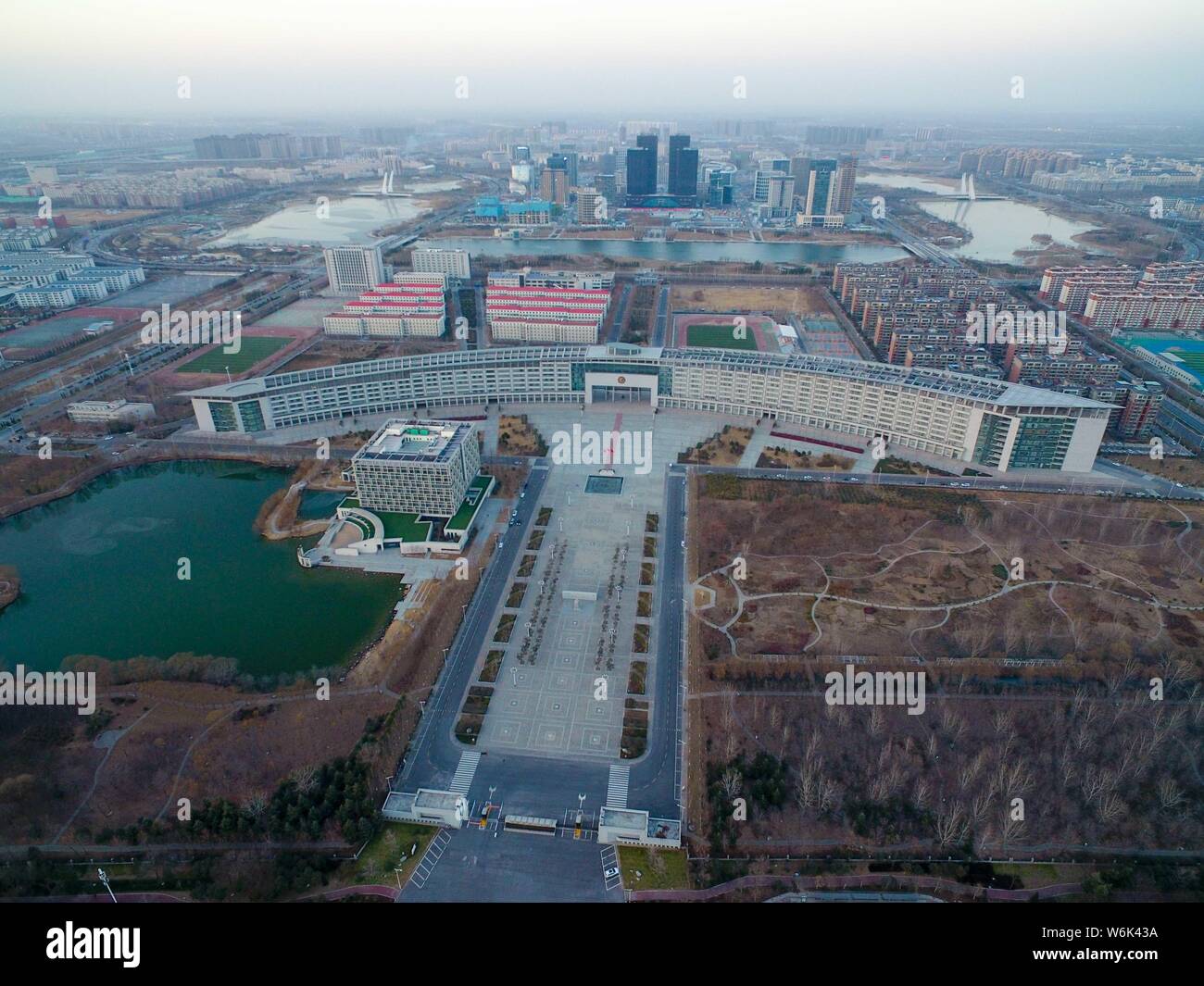 An aerial view of a 700-meter-long teaching building resembling a bow ...