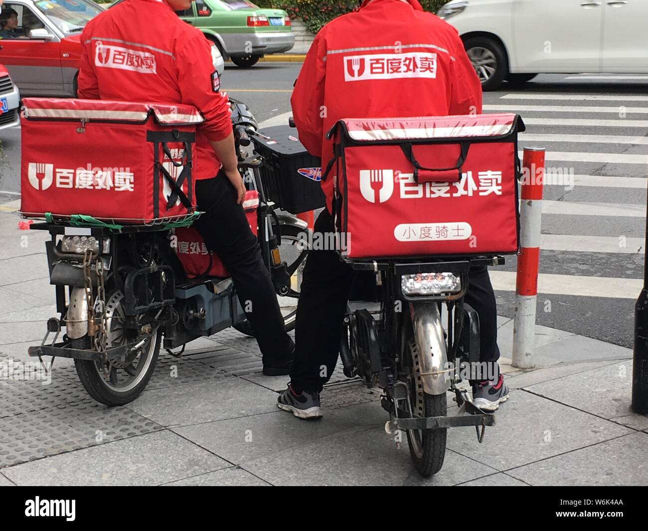 --FILE--Food delivery couriers of Chinese online food delivery company ...