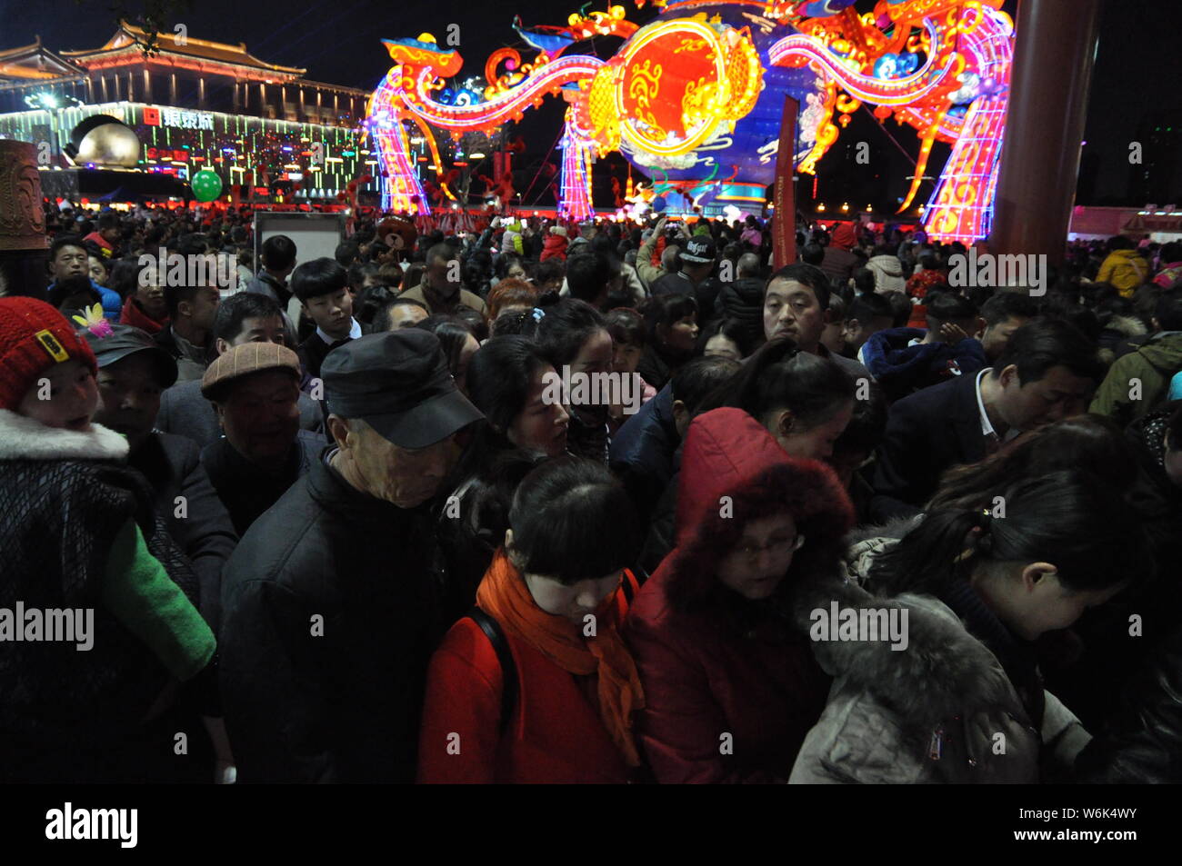 Tourists crowd a scenic spot during the Chinese Lunar New Year holiday ...