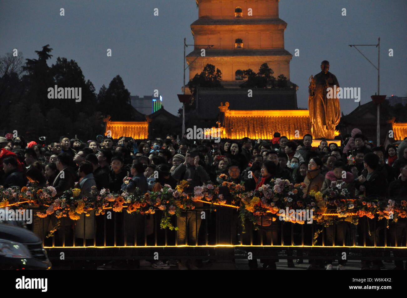 Tourists crowd the Dayan Tower Cultural and Leisure Scenic Resort ...