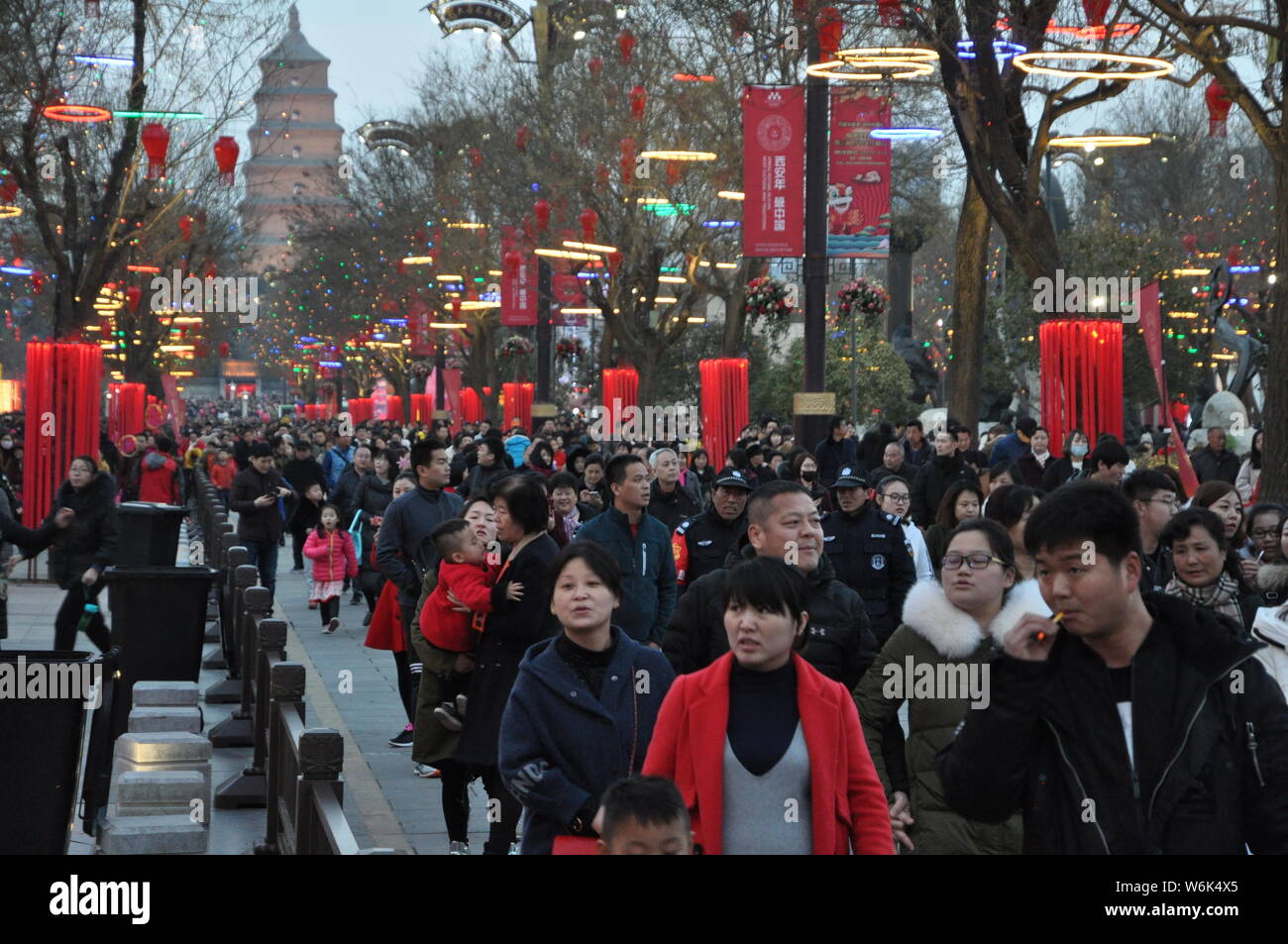 Tourists crowd the Dayan Tower Cultural and Leisure Scenic Resort ...