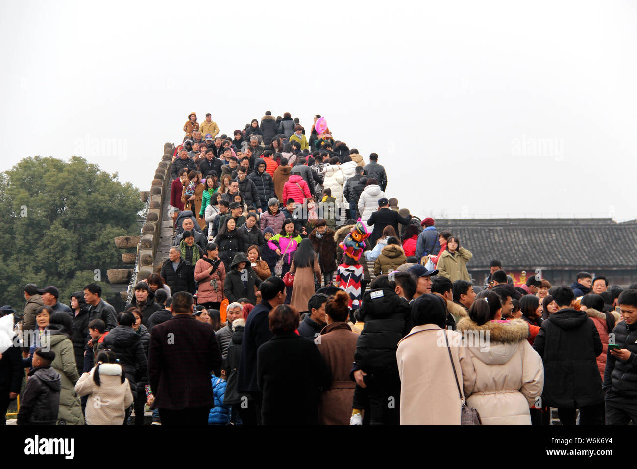 Tourists crowd a scenic spot during the Chinese Lunar New Year holiday ...