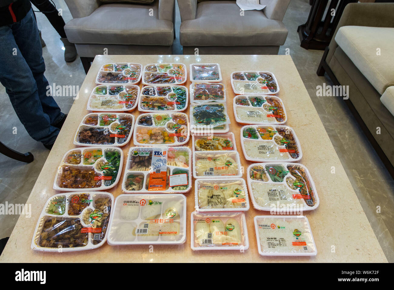 Food-filled lunch boxes are on display at a food processing plant of ...