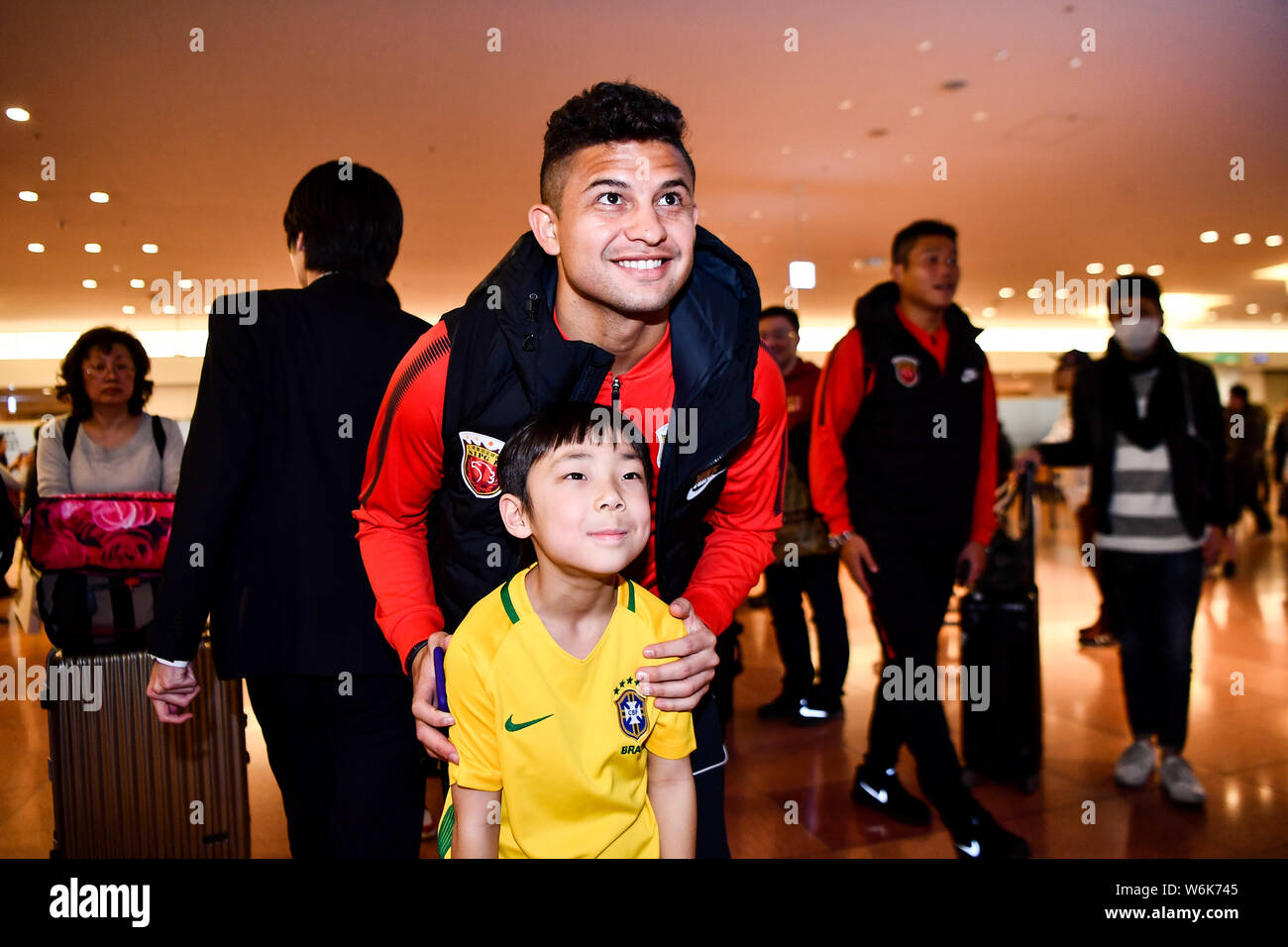 Brazilian football player Elkeson of Shanghai SIPG F.C. poses with a ...