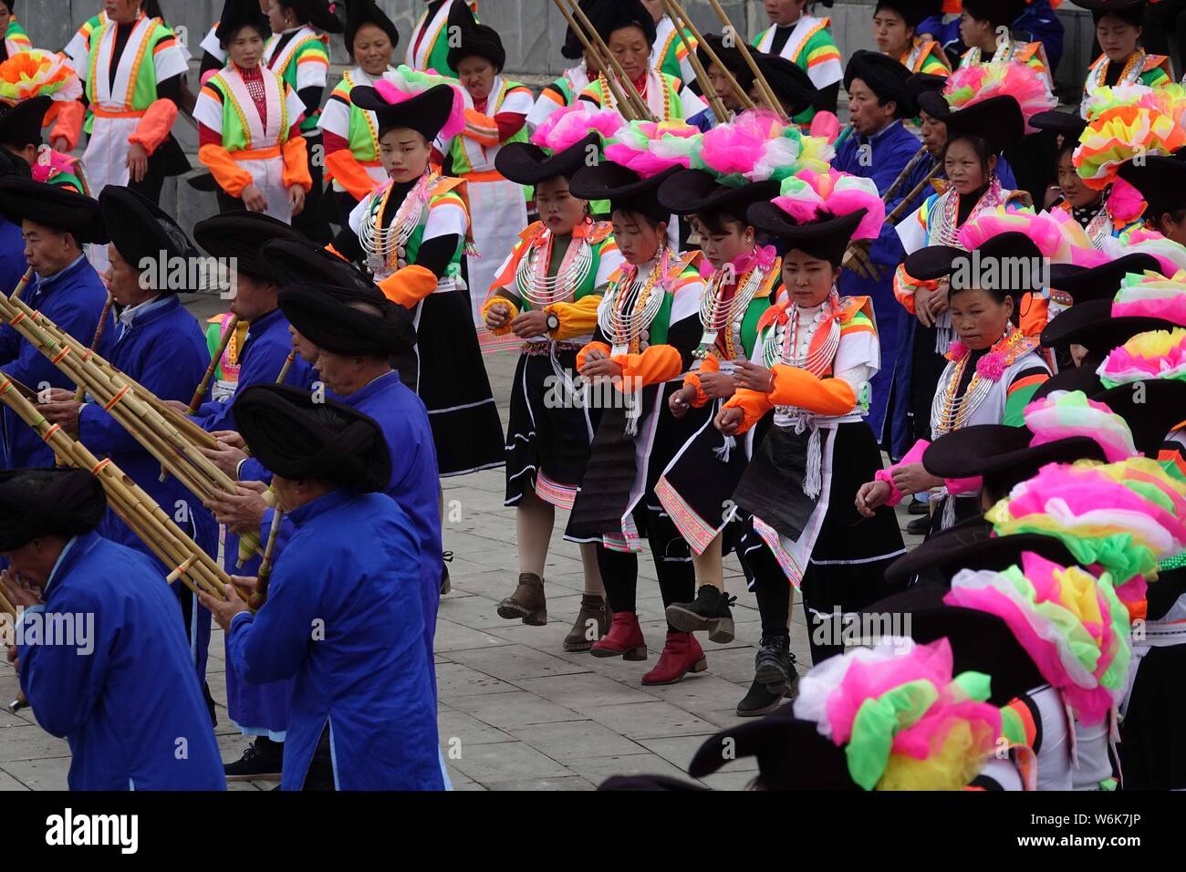 Chinese people of Miao ethnic minority gather in a circle to dance and ...