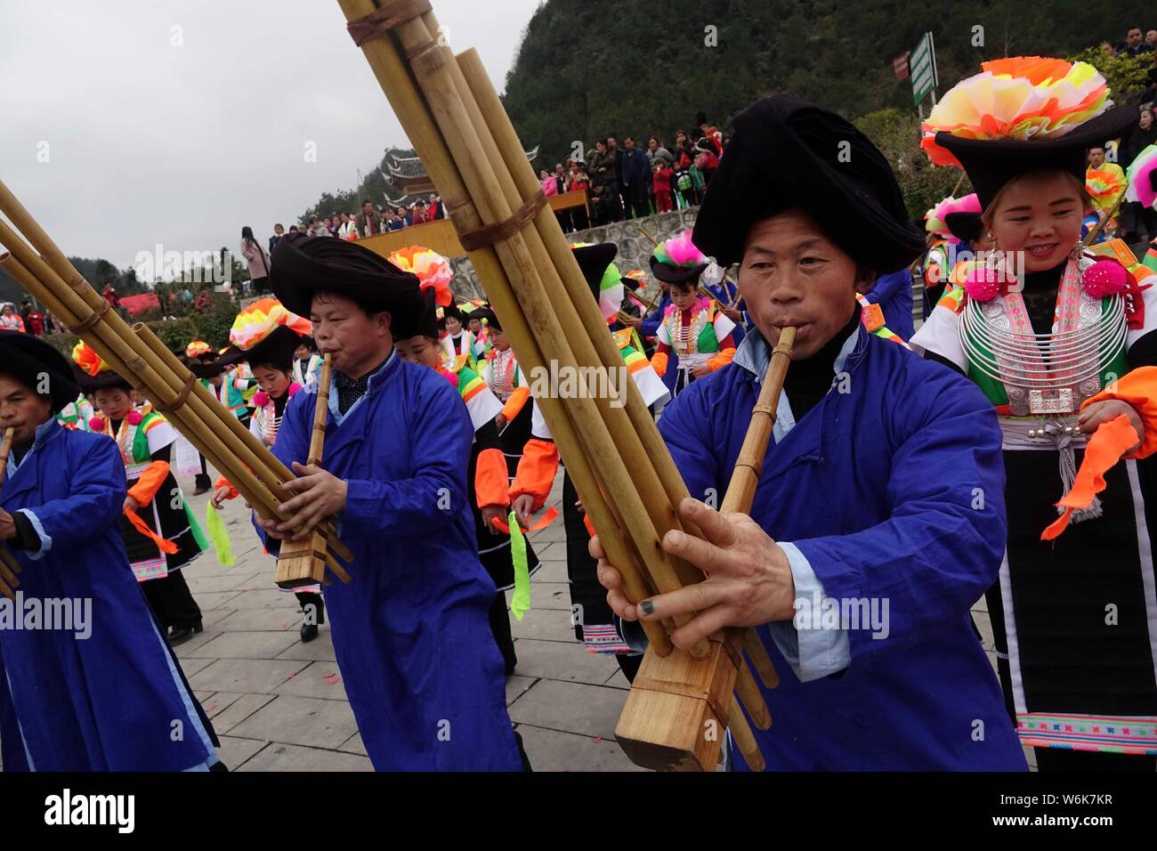 Chinese people of Miao ethnic minority gather in a circle to dance and ...