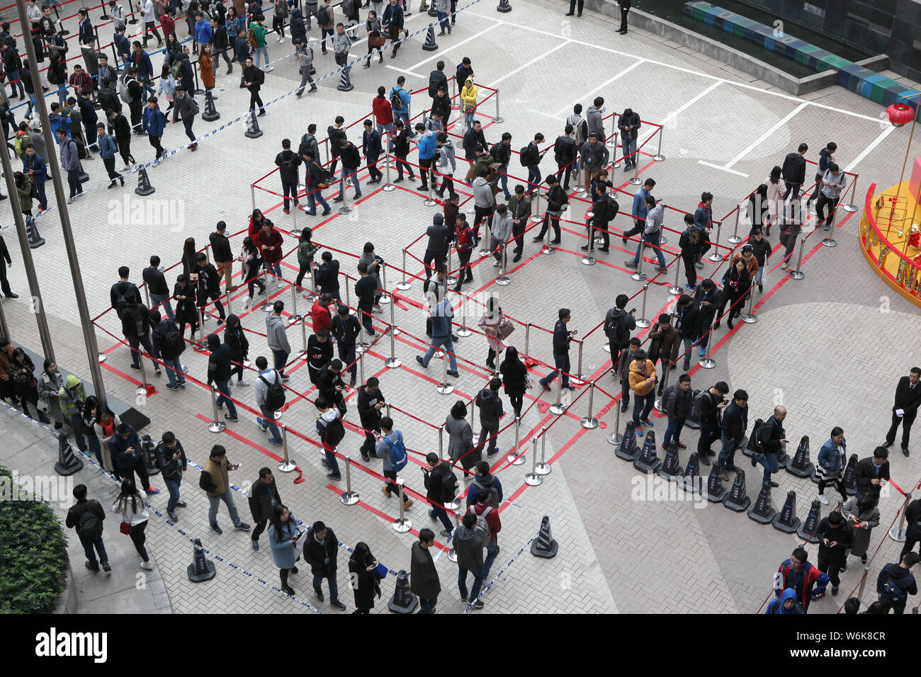 Employees of Chinese Internet giant Tencent queue up in shape of ...