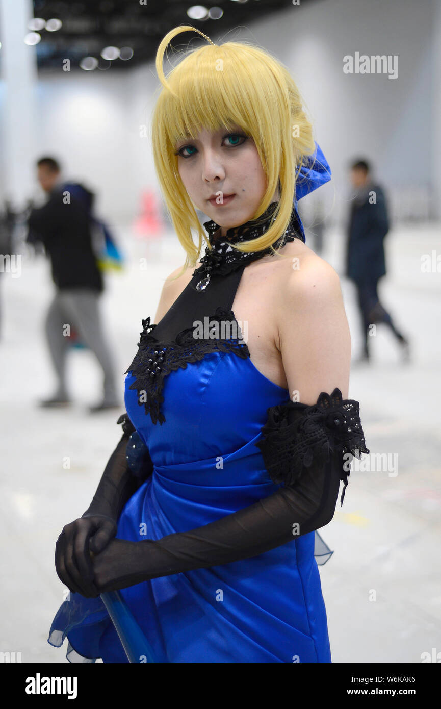 A Chinese coser dressed in cosplay costume poses during an animation ...