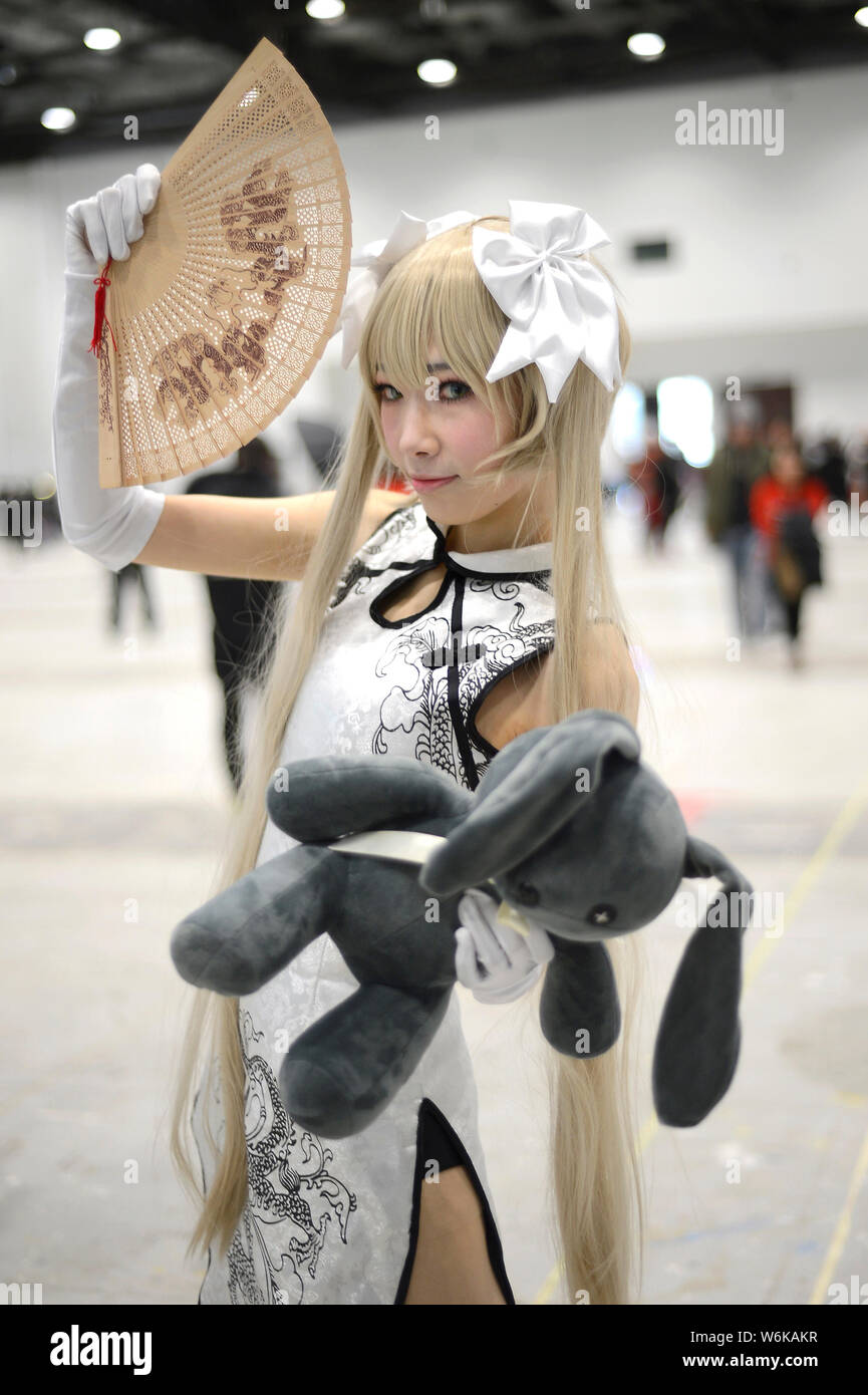 A Chinese coser dressed in cosplay costume poses during an animation ...