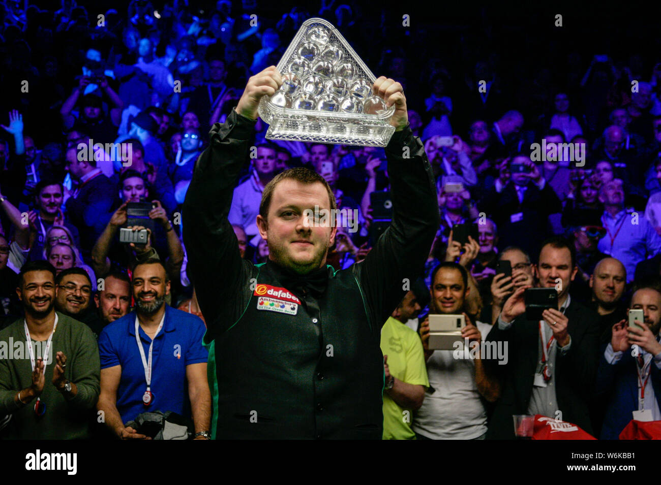 Mark Allen of Northern Ireland poses with his trophy after defeating ...