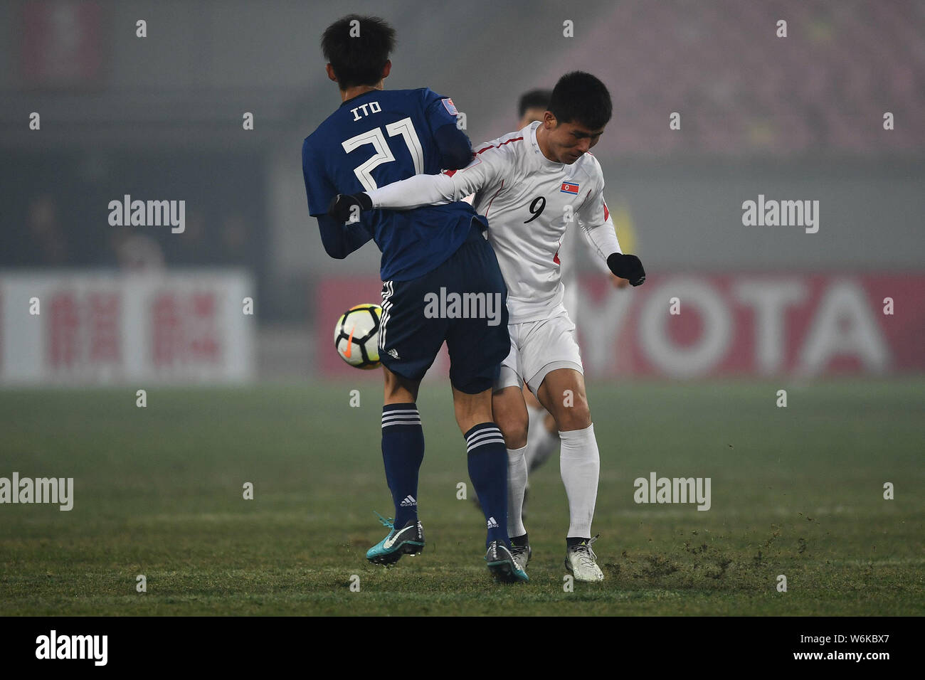 Hiroki Ito of Japan, left, challenges Kim Yu-song of North Korea in ...