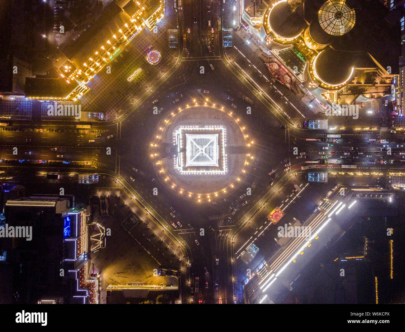 Aerial view of the Bell Tower, buildings and streets at night in Xi'an ...