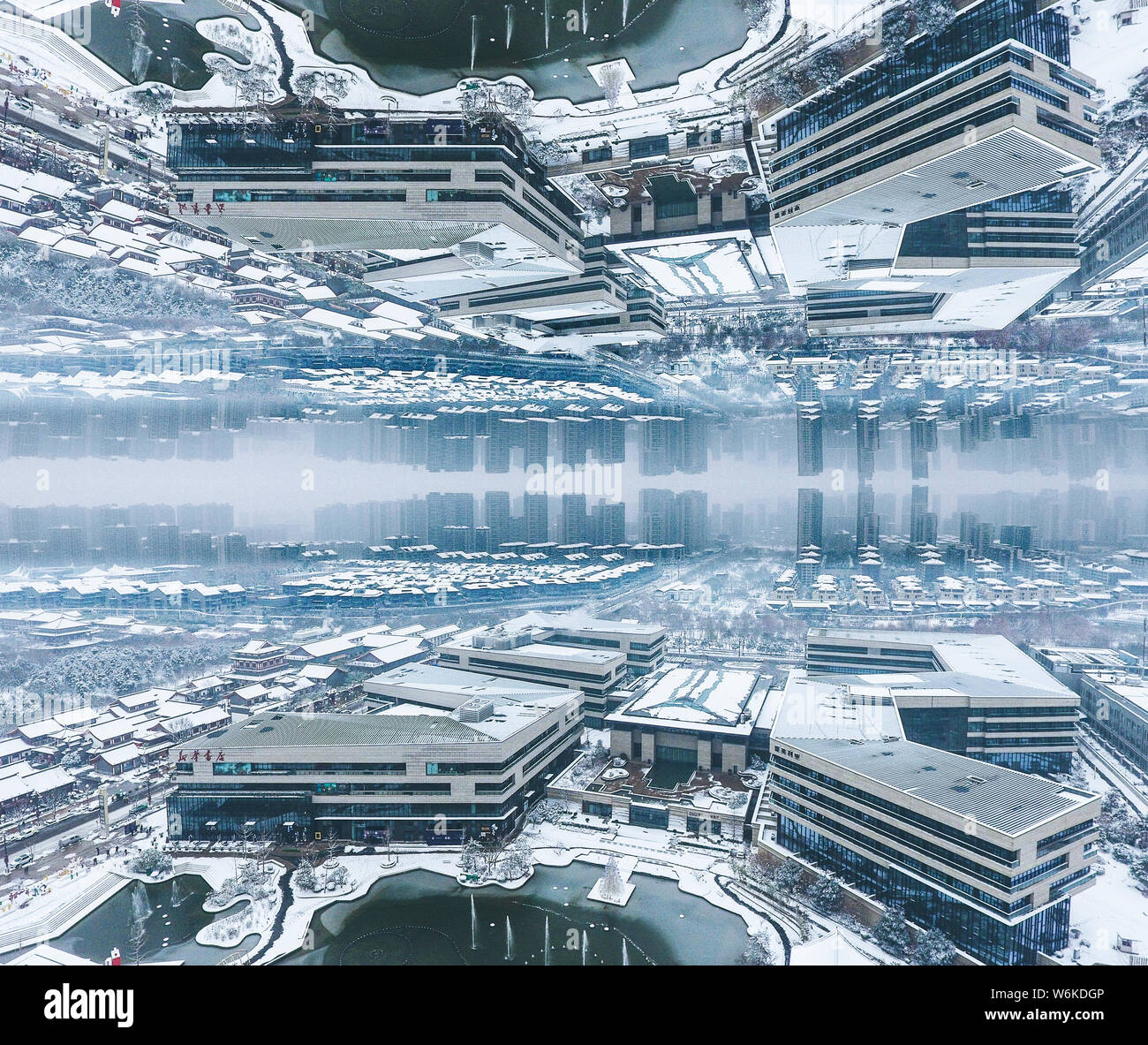 This retouched photo shows snow view of a tourist attraction in Xi'an ...