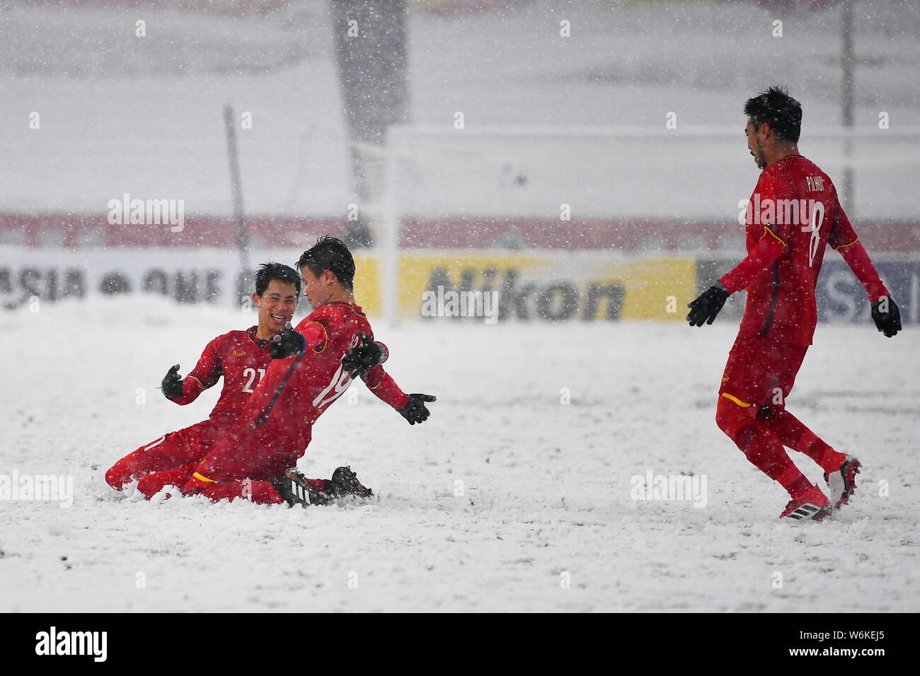 Players of Vietnam celebrate after scoring against Uzbekistan in their final match to fight for ...