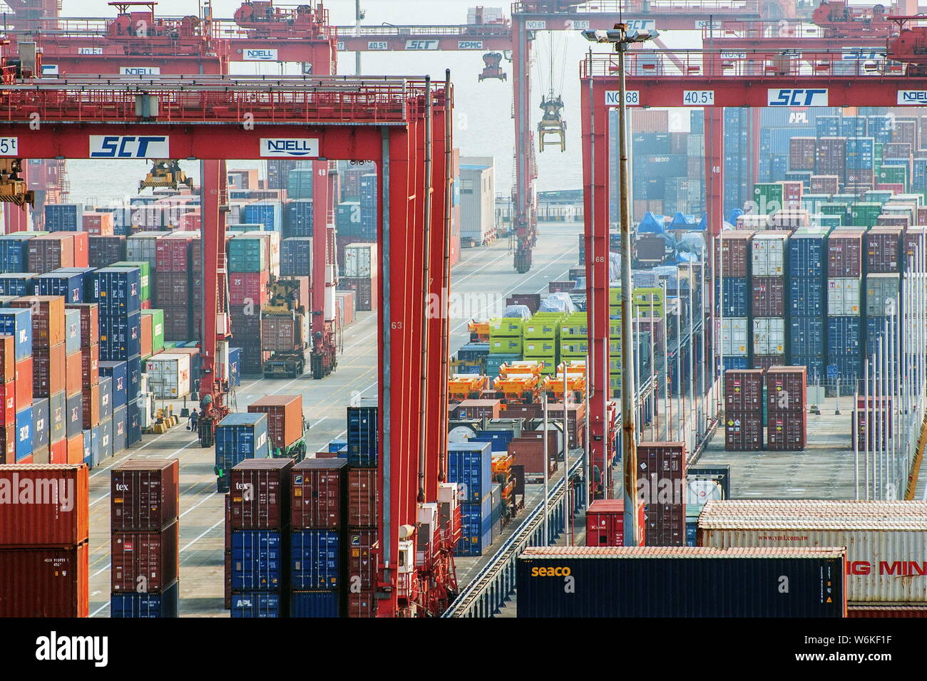 --FILE--Containers are piled up at a container terminal at the Shekou ...