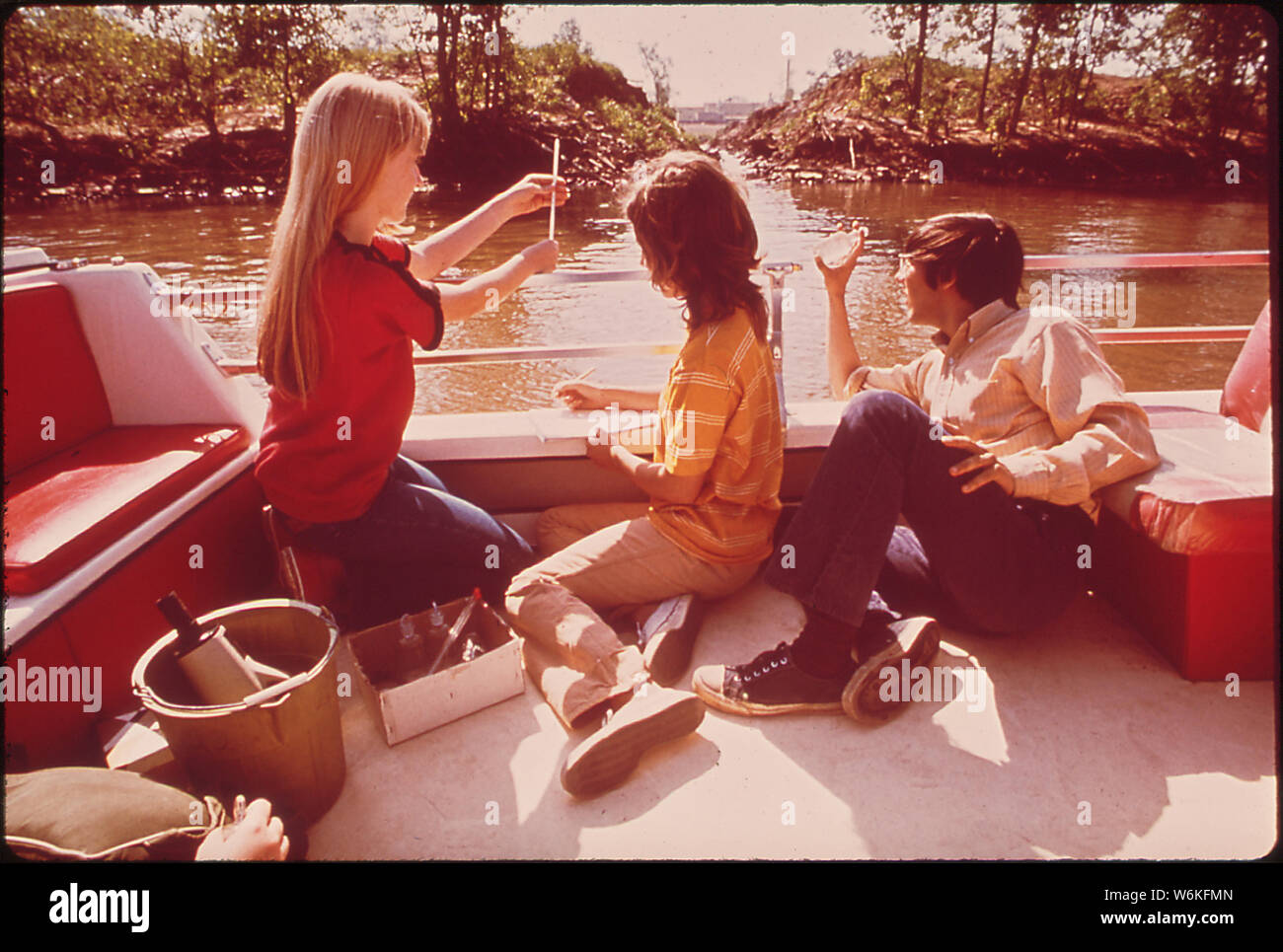 SCHOOL CHILDREN TESTING WATER FOR PURITY Stock Photo - Alamy