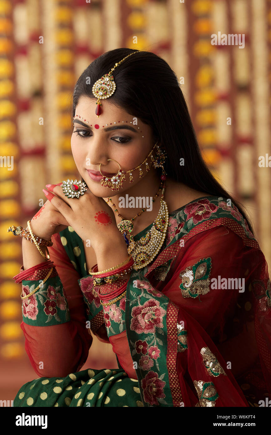Indian bride sitting hi-res stock photography and images - Alamy