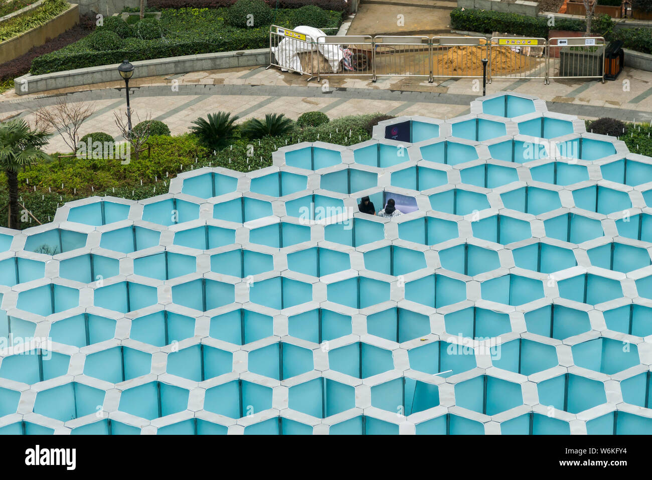 Aerial view of a huge labyrinth featuring a honeycomb with 129 cells ...