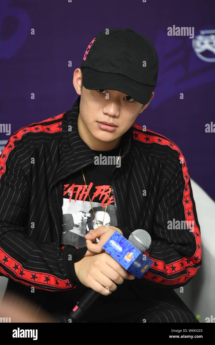 --FILE--Chinese rapper Wang Hao, better known as PG One, reacts during ...